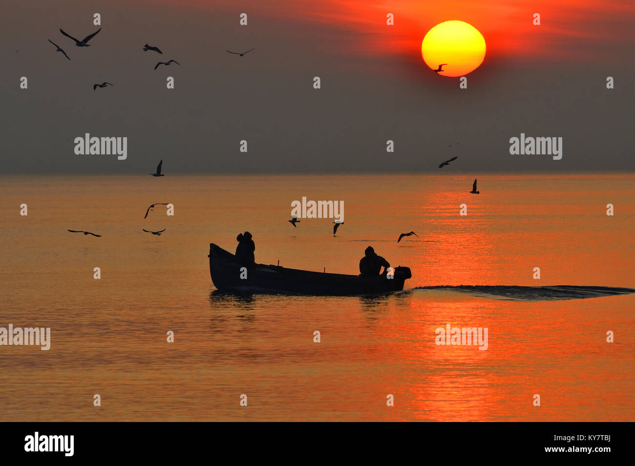 Early morning fishing boat at sunrise,Fishermen fishing in the early ...