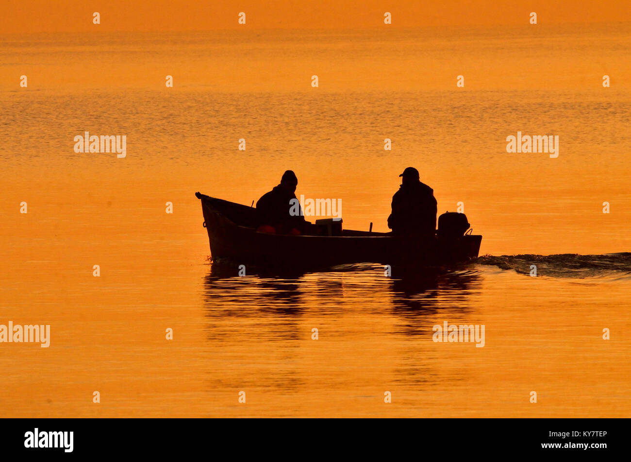 Early morning fishing boat at sunrise,Fishermen fishing in the early ...