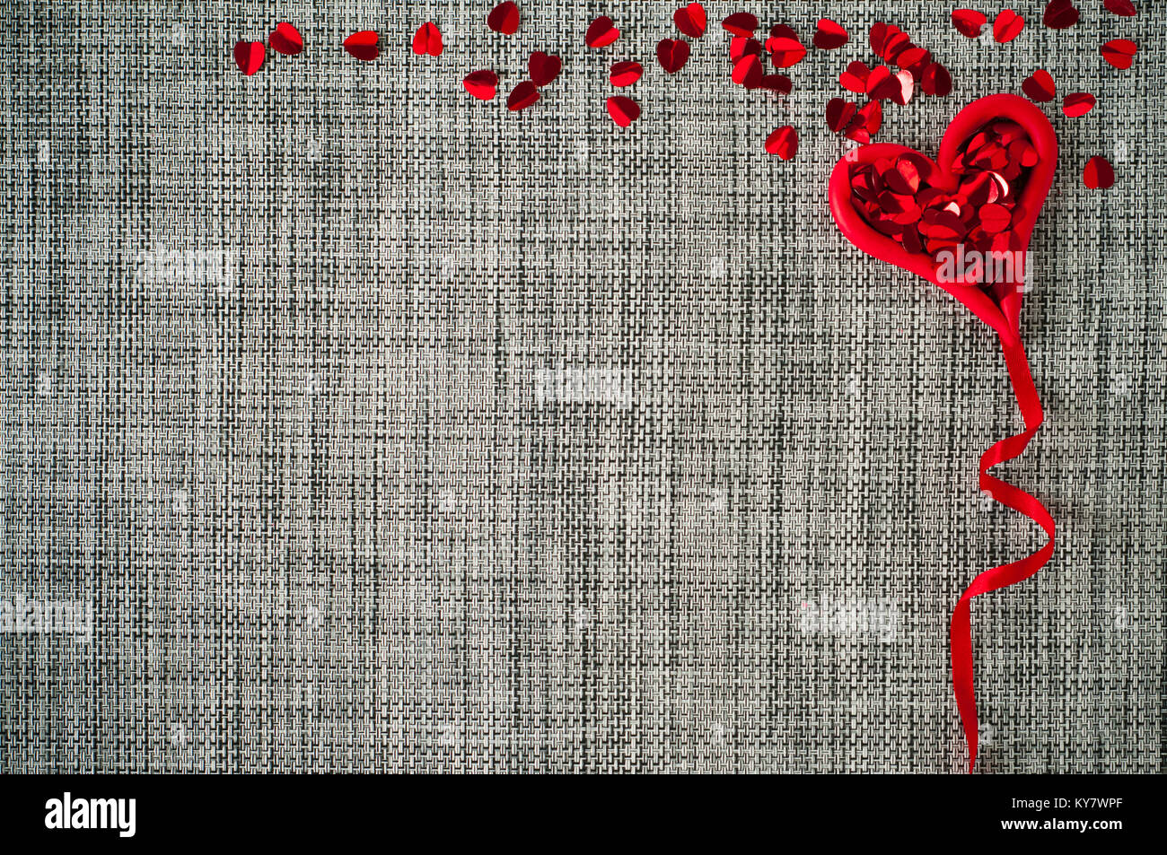 Grey fabric valentine background Stock Photo - Alamy