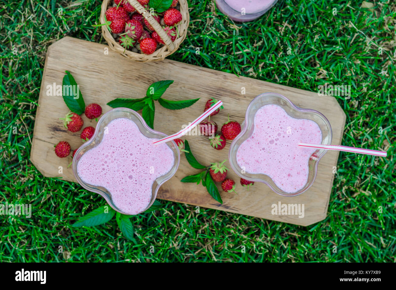 Strawberrie smoothie outside summer, basket with strawberries Stock ...