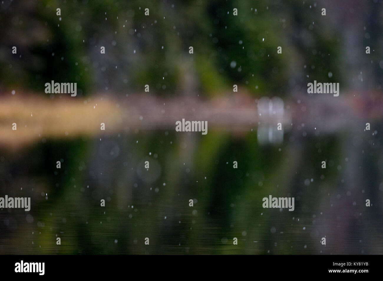 Snow falling on lake hi-res stock photography and images - Alamy