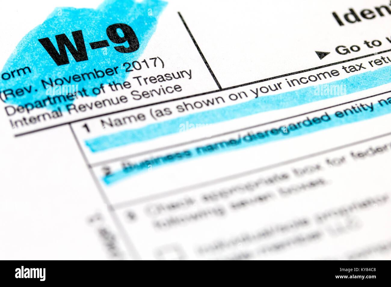 A macro closeup of a highlighted W9 federal income tax form Stock Photo ...