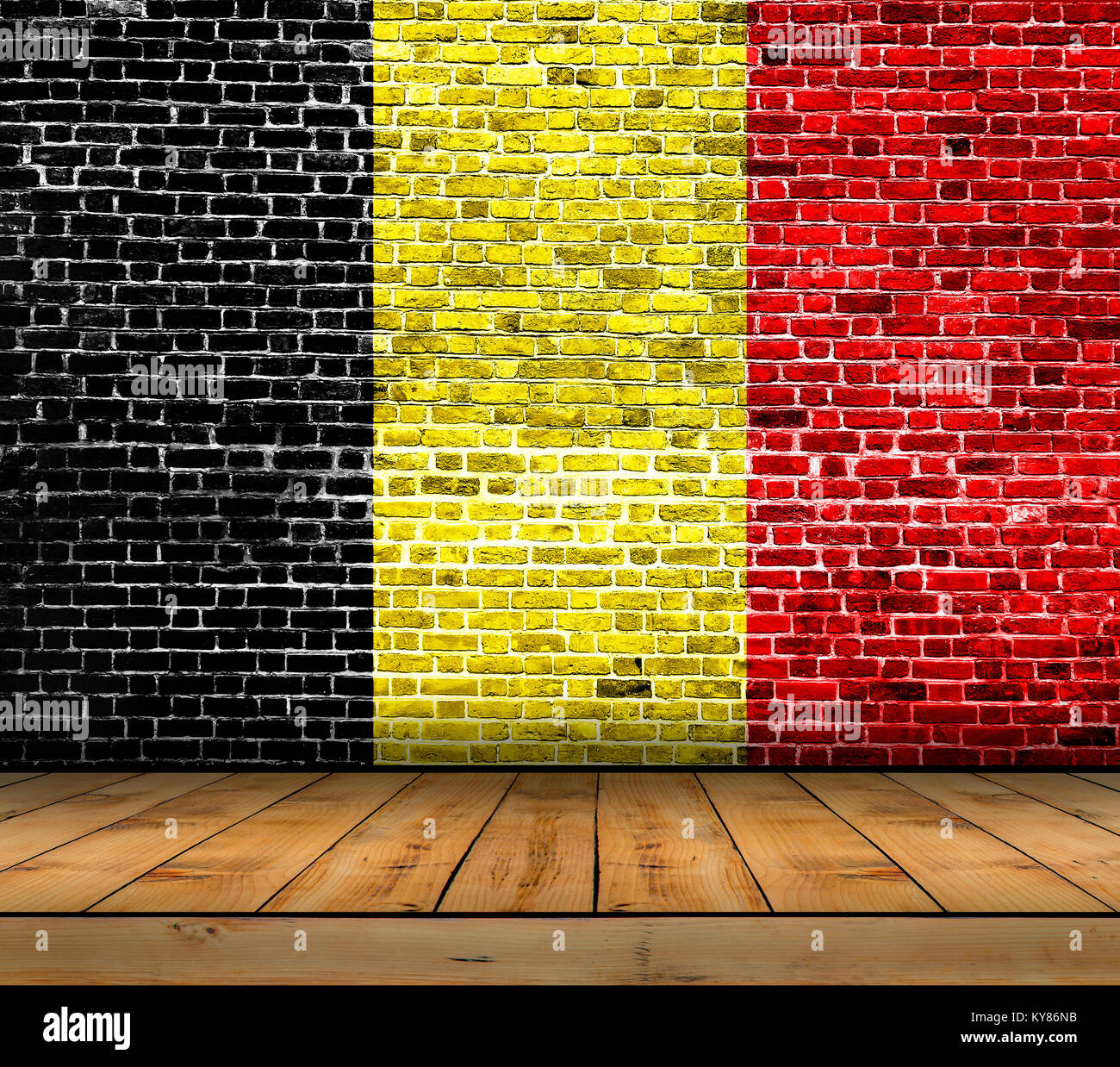 Belgium flag painted on brick wall with wooden floor Stock Photo - Alamy