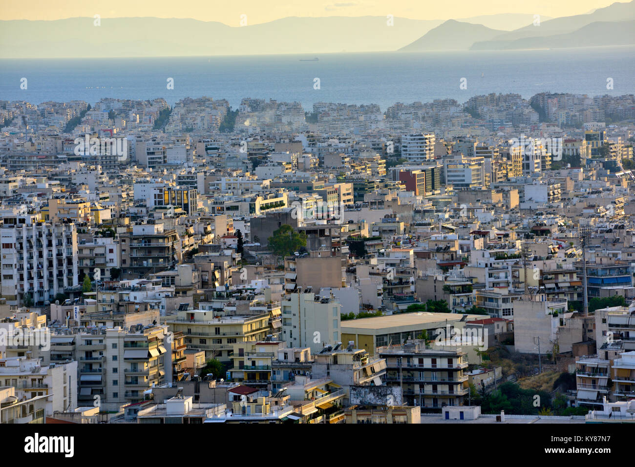 Near sunset view over city of Athens looking toward sea from Filopappou ...