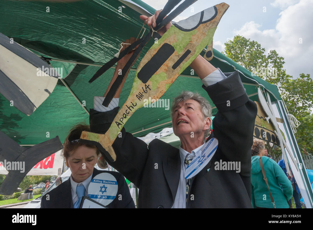 The 'Arms Salesmen' decorate the 'Israeli Pavilion of Shame' with a cut ...