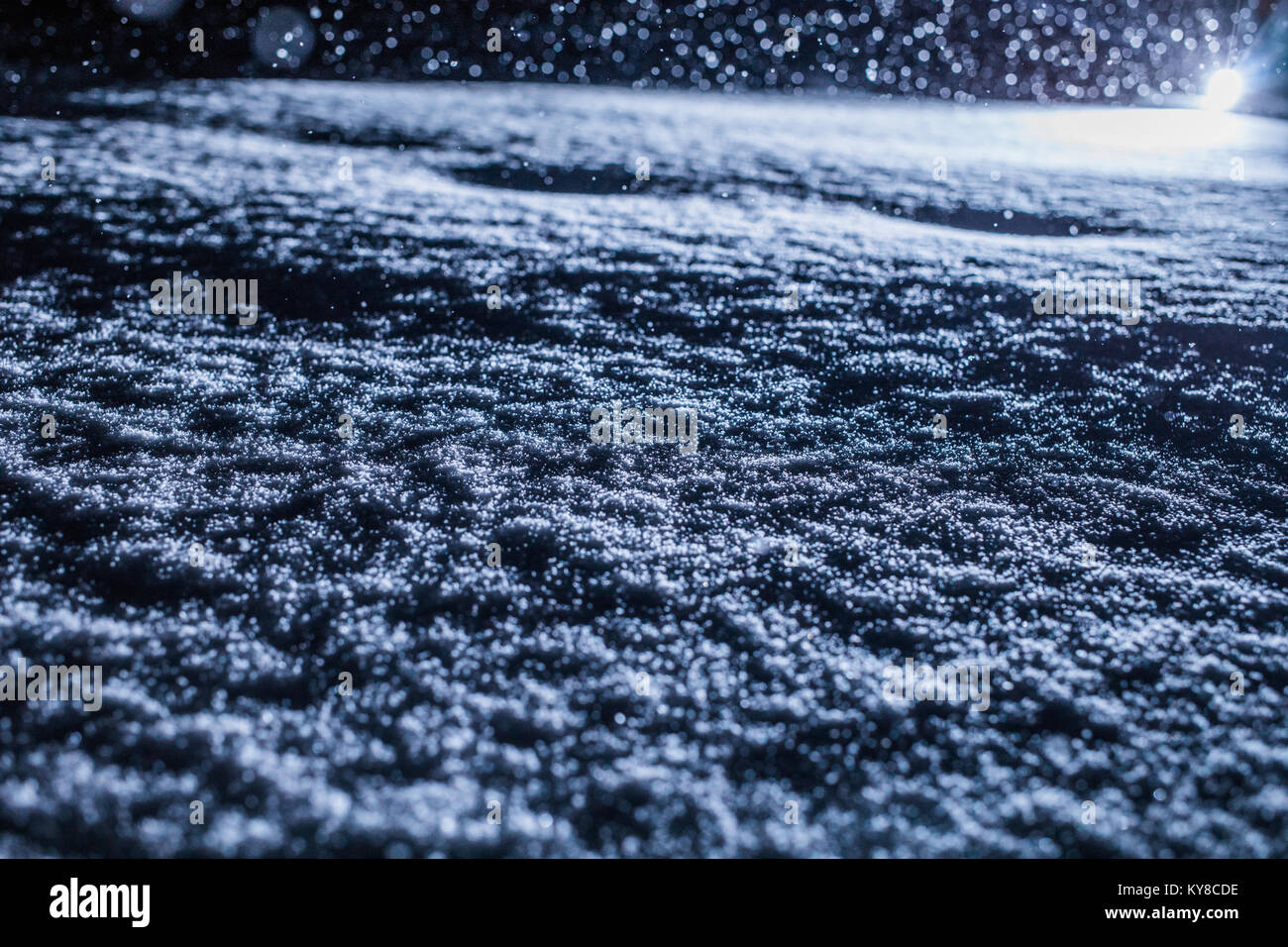 Backlighted Snow Texture and Lens Flare during Snowstorm at Night Stock ...