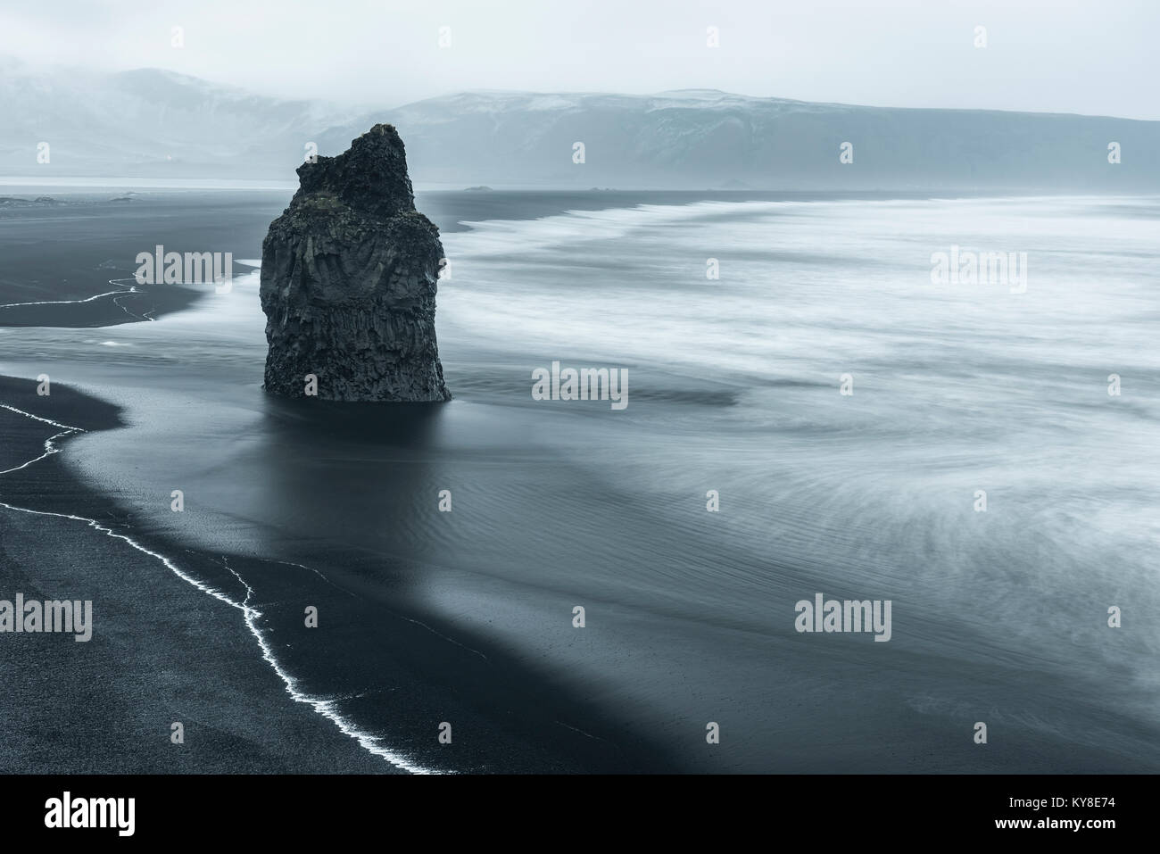 Sea stack on Dyrholaey beach, North Atlantic, Iceland. Mid-November, by ...