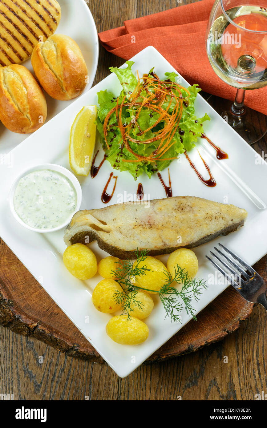 baked fish with potatoes Stock Photo - Alamy