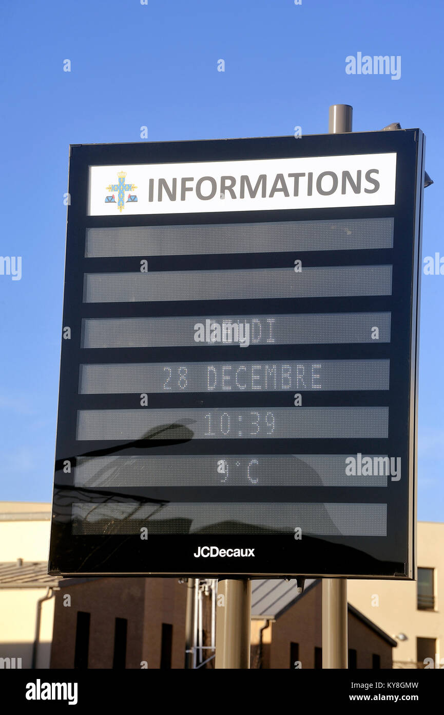 Bright billboard in town to announce the date, temperature, but also ...