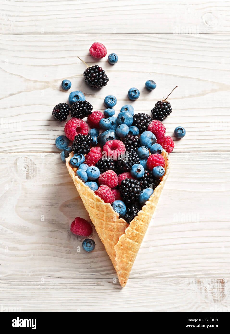 Explosion of different berries. Photo of blueberry, blackberry ...