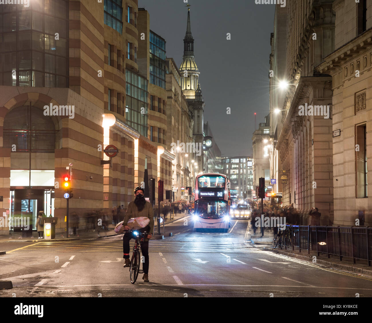 London, England, UK - January 11, 2018: Pedestrians walk past cyclists ...