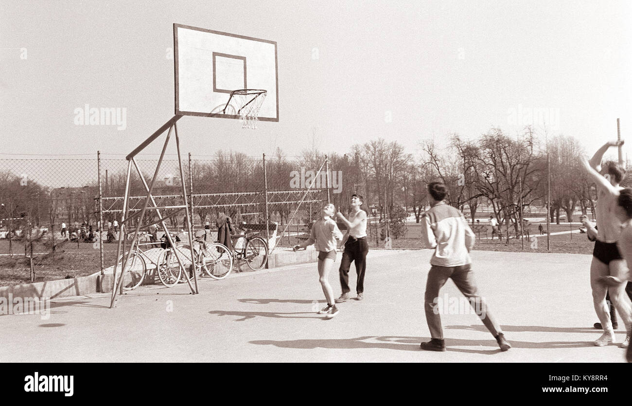 This photograph from 1961 captures a basketball game taking place at ...