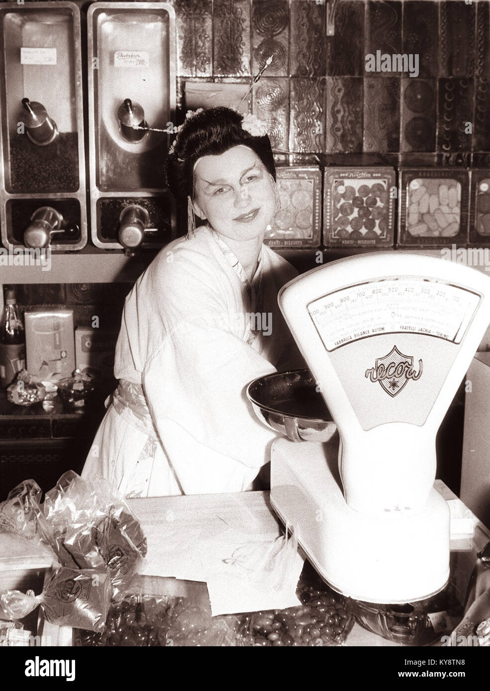 Black-and-white photograph showing shop assistants dressed in Japanese ...