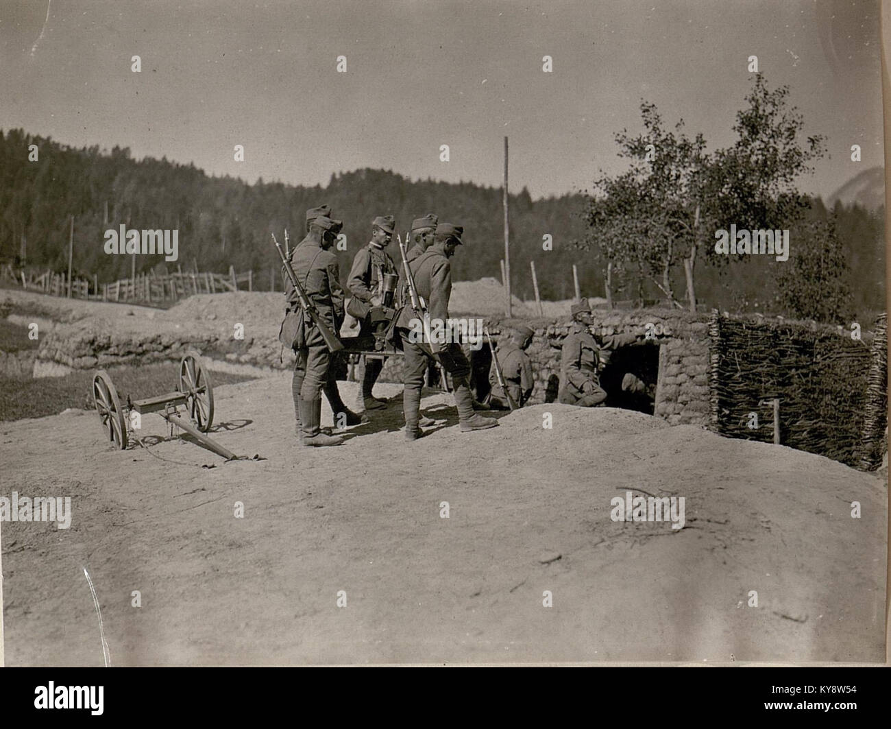 A German medium mortar being transported from a cart to a trench on ...