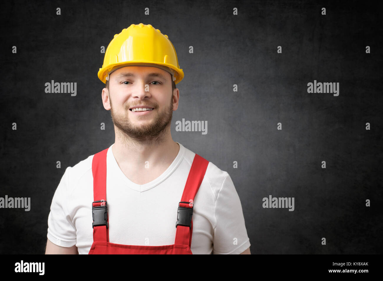 Happy worker smiling Stock Photo - Alamy