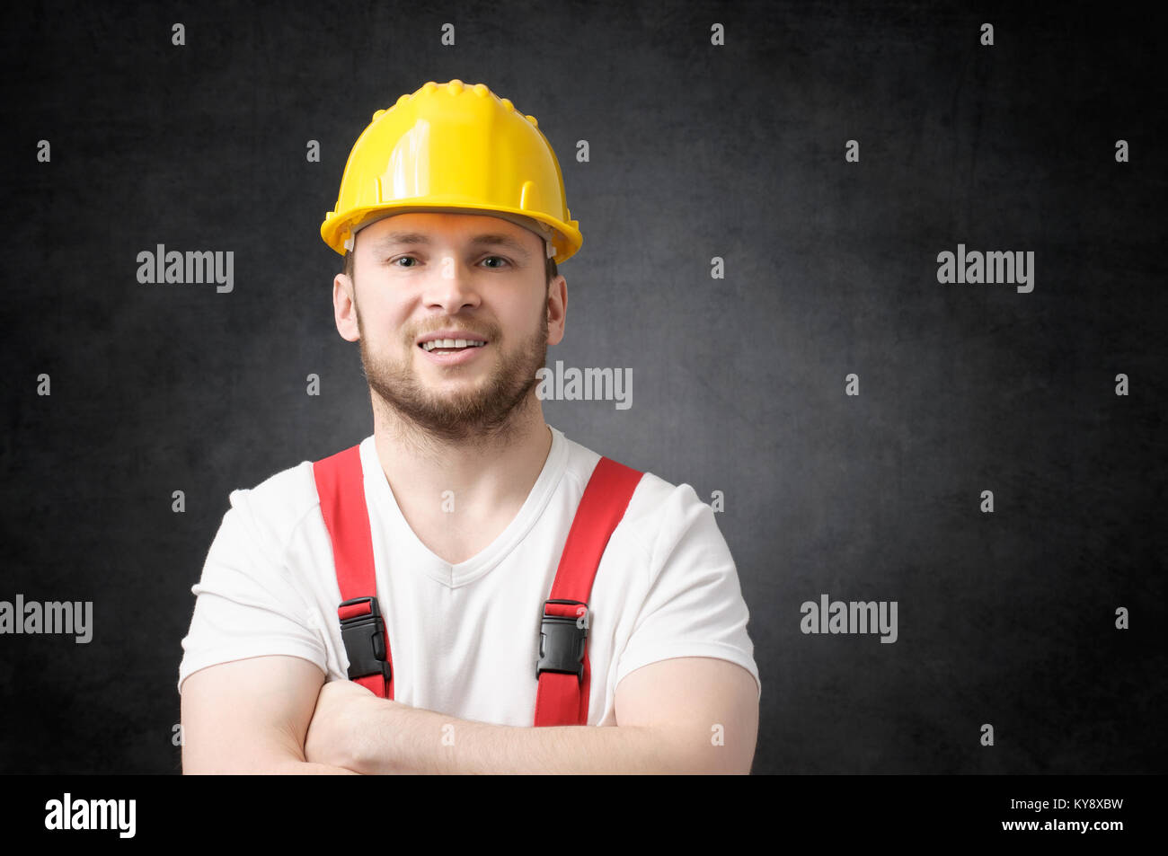 Happy worker smiling Stock Photo - Alamy