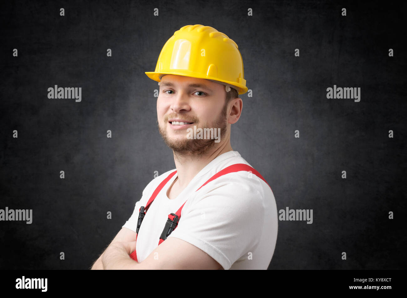 Happy worker smiling Stock Photo - Alamy