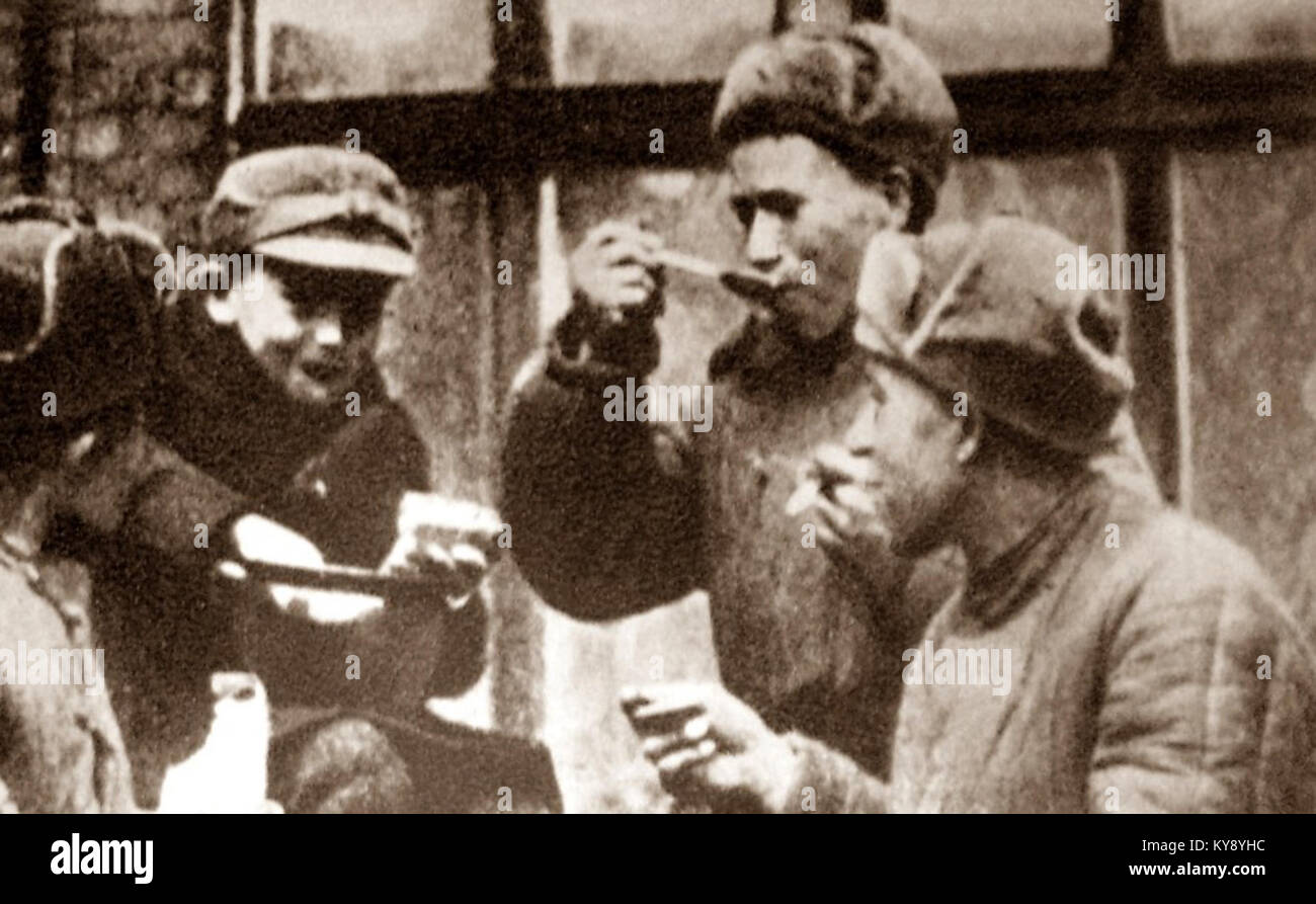 This photograph captures Polish soldiers eating a meal in Poznań, 1945 ...