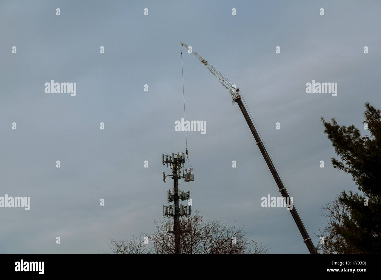 Tower climber and working on cellular tower system. installation of ...