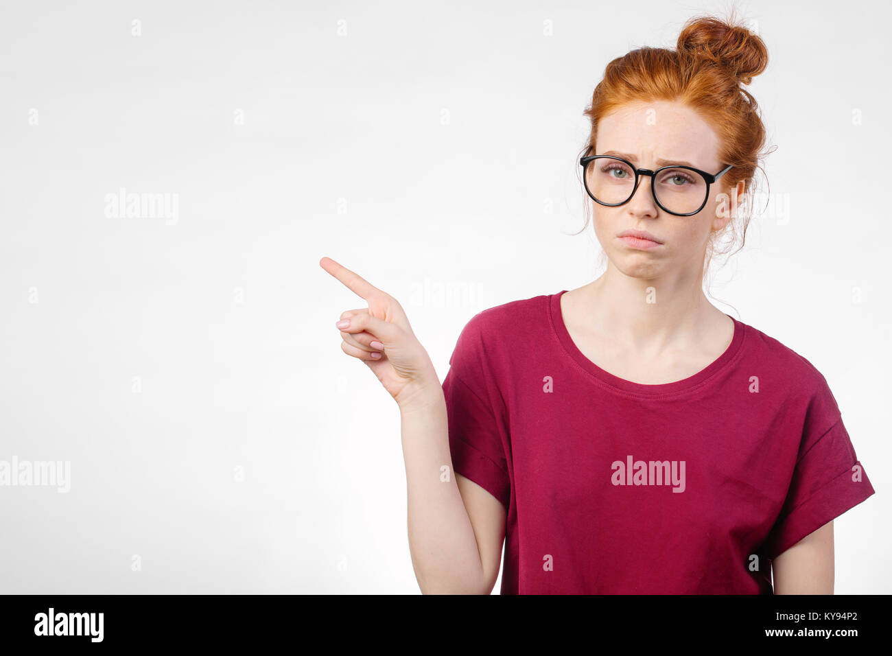 unhappy woman pointing up. Negative emotion, facial expression feeling ...