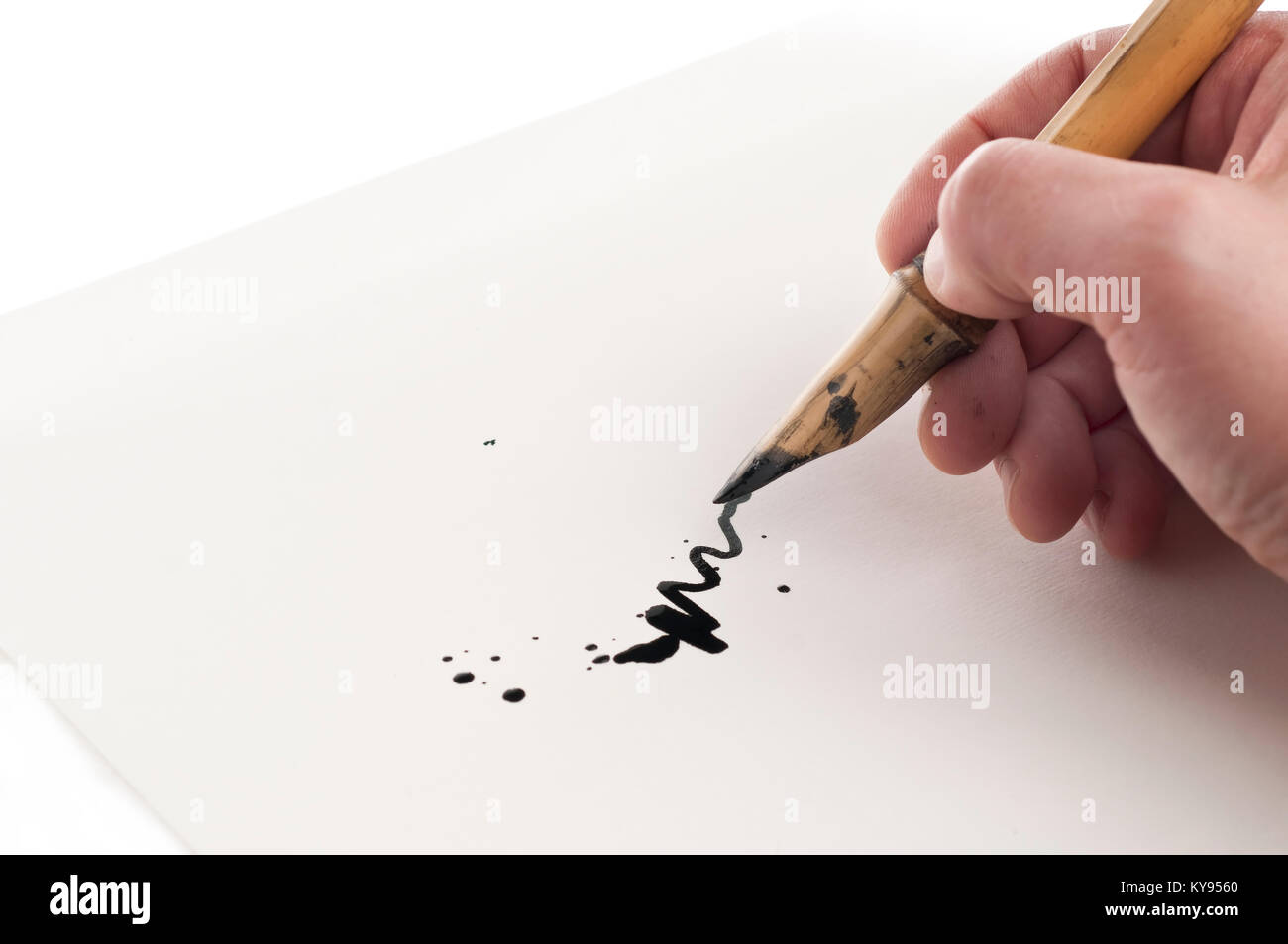 bamboo drawing pen and black ink marks Stock Photo - Alamy