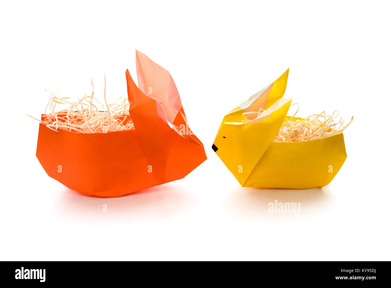 Two colorful origami bunny rabbit paper baskets in yellow and orange ...