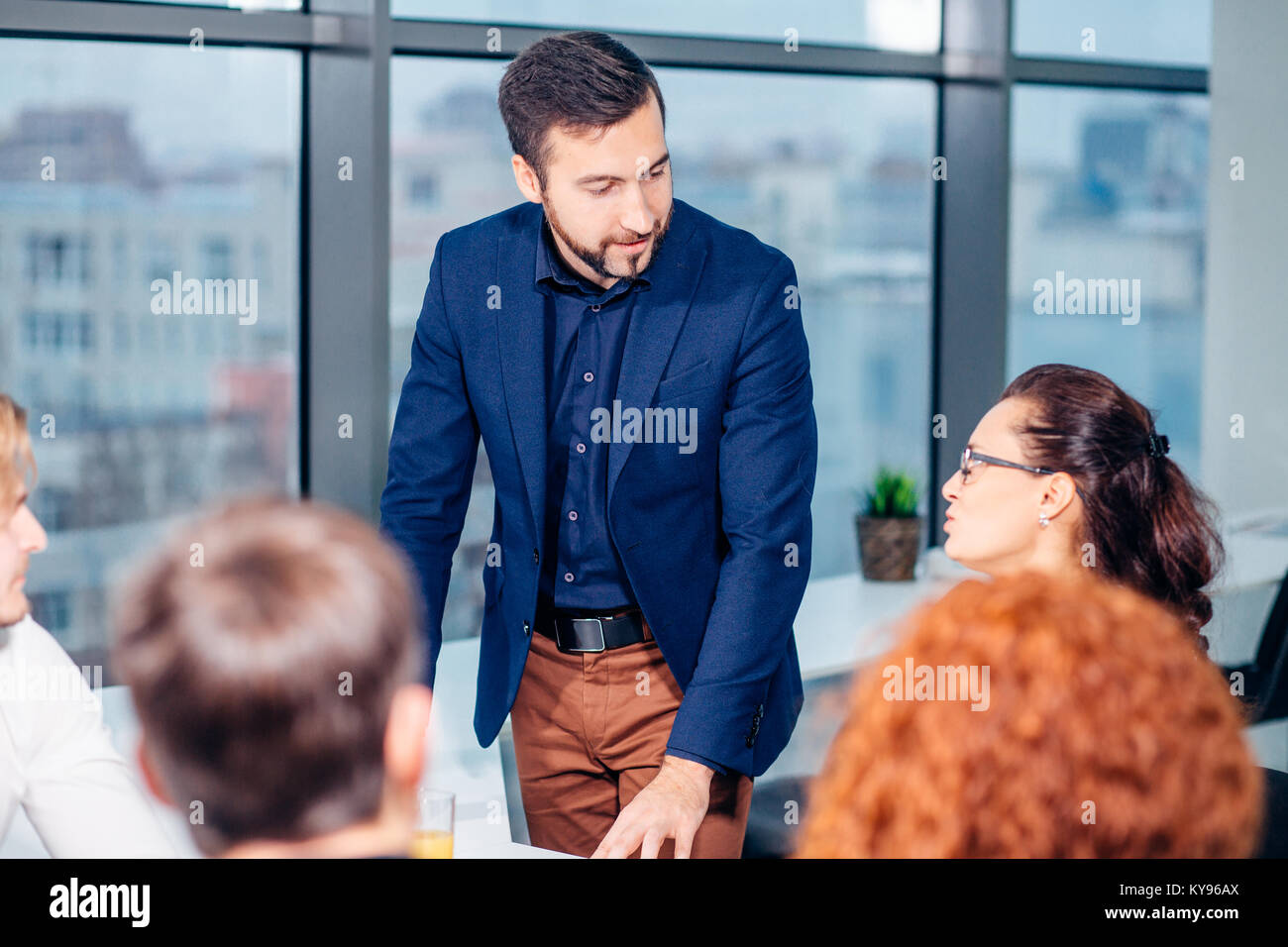 Successful business presentation of man at office Stock Photo - Alamy