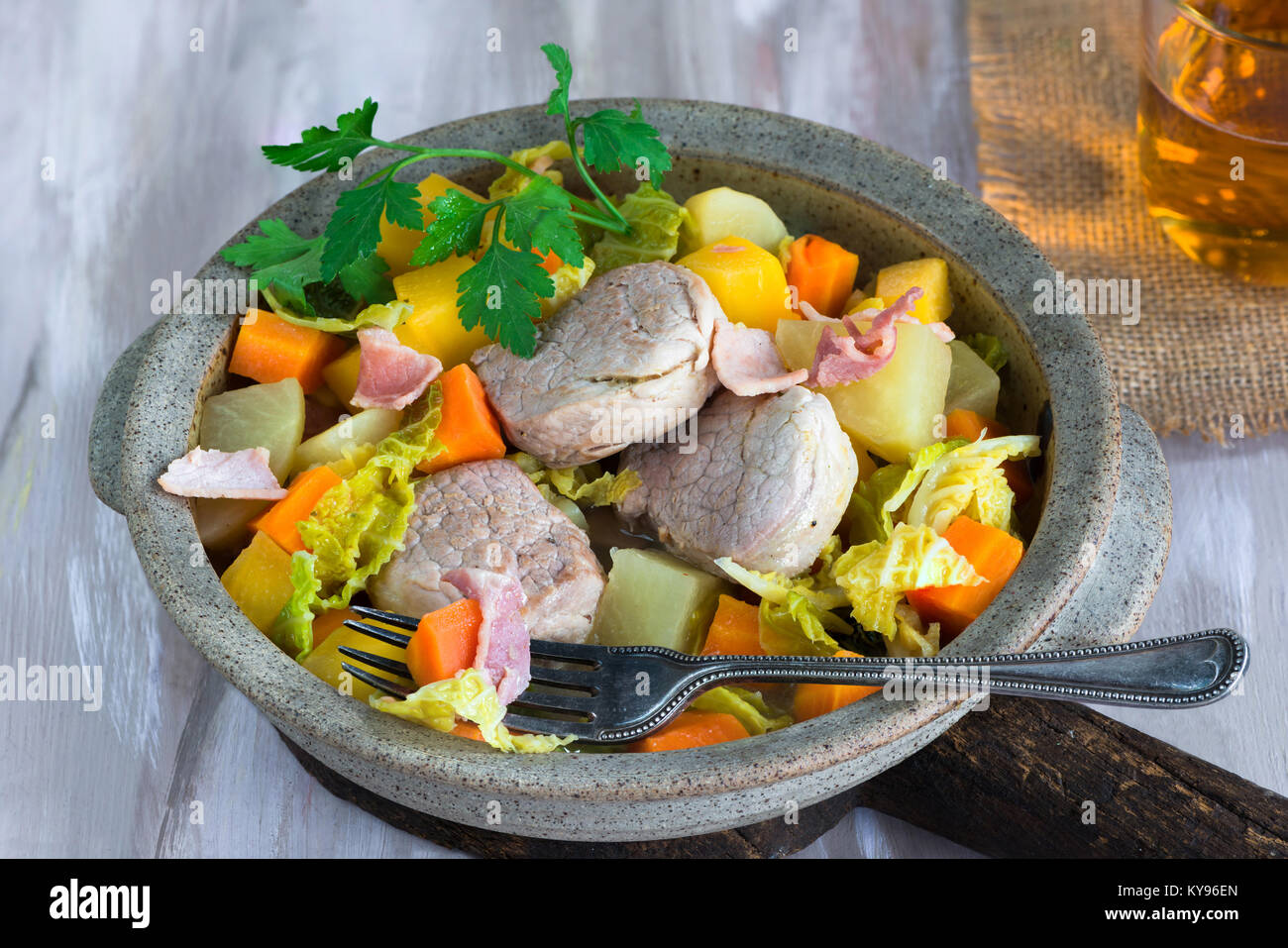 Irish pork stew with potatoes, cabbage, carrot, swede and bacon cooked ...