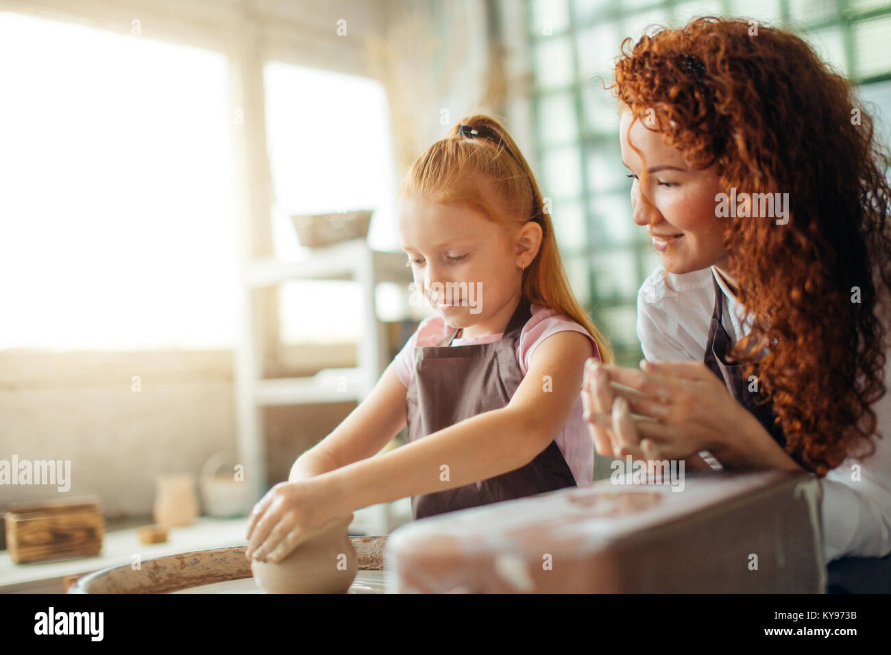 Child molding people clay hi-res stock photography and images - Alamy