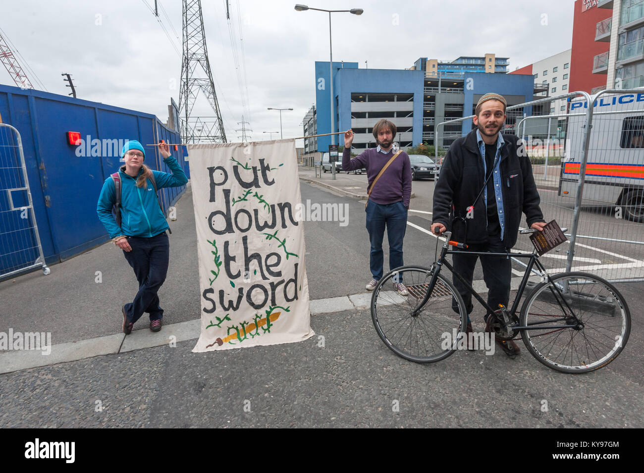 The Put Down the Sword banner blocking the DSEi Arms Fair west entrance ...