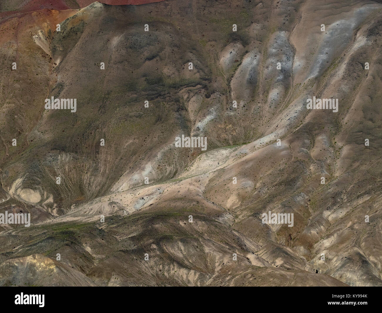 Abstract background from a mountain slope with meandering flowing rocks ...