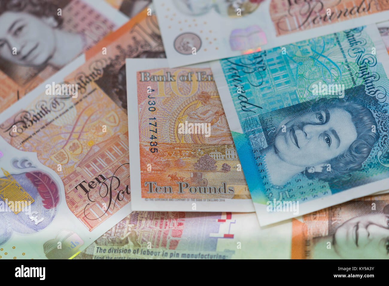 British bancknotes close up, including 5 pounds note, 10 pounds notes ...