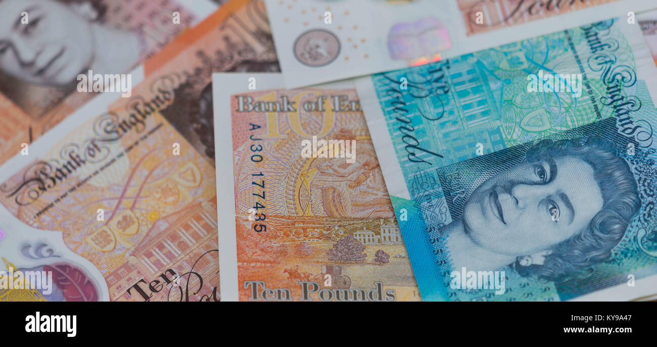 British bancknotes close up, including 5 pounds note, 10 pounds notes ...