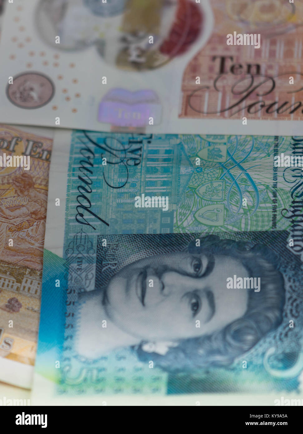 British bancknotes close up, including 5 pounds note, 10 pounds notes ...