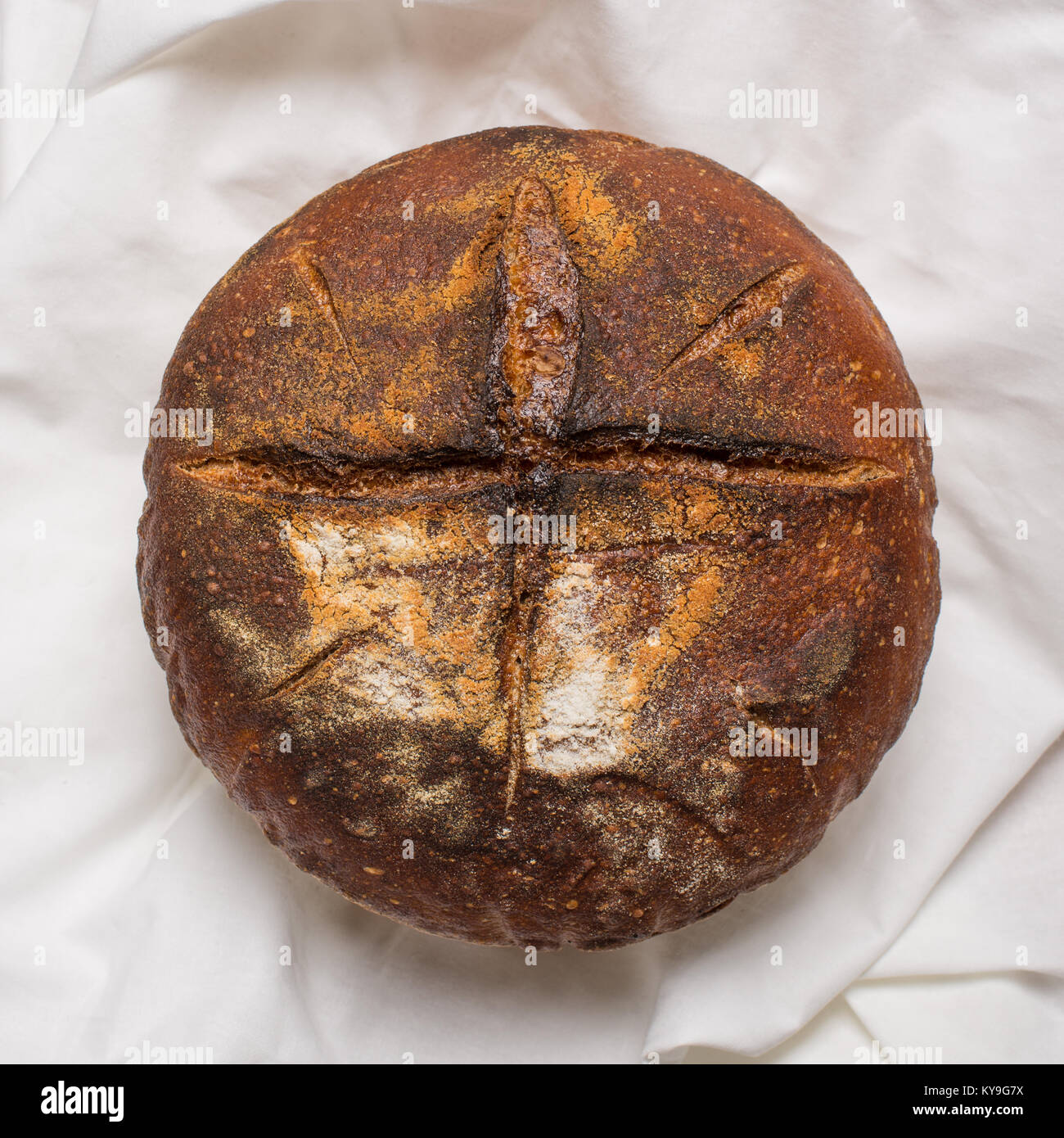 Homemade Easter traditional sourdough bread with cross sign cut Stock ...