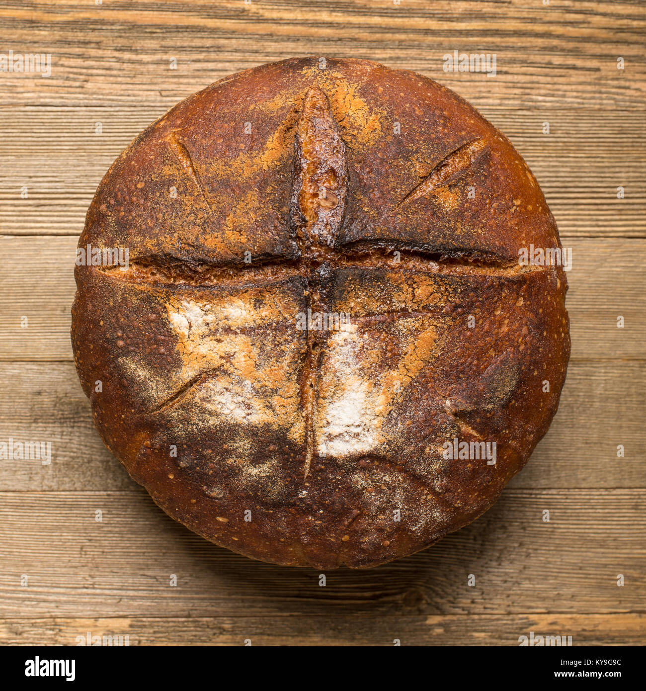 Homemade Easter traditional sourdough bread with cross sign cut Stock ...