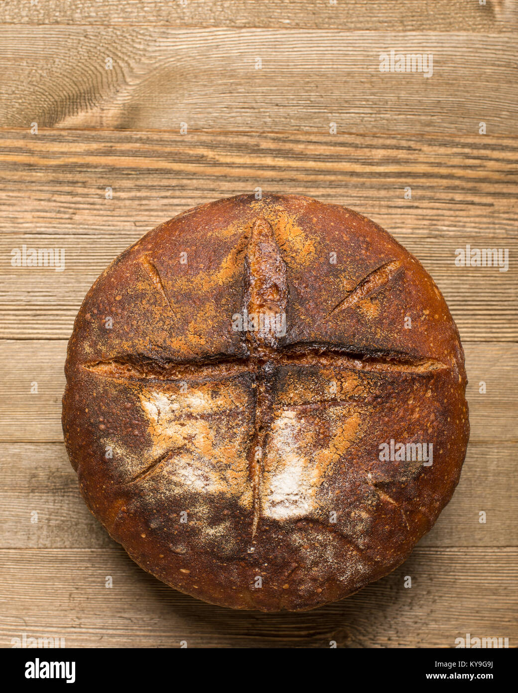 Homemade Easter traditional sourdough bread with cross sign cut Stock ...
