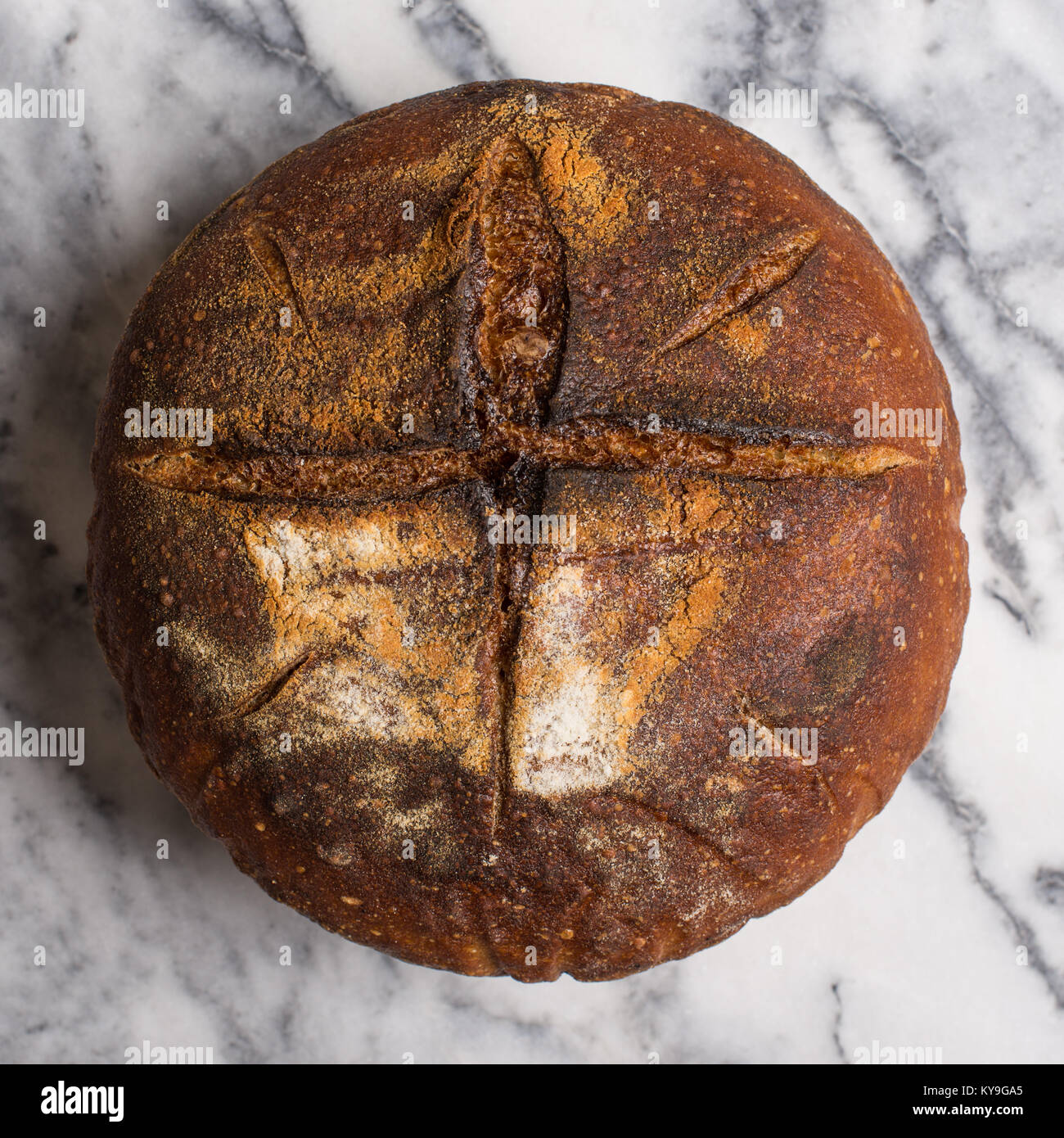 Homemade Easter traditional sourdough bread with cross sign cut Stock ...