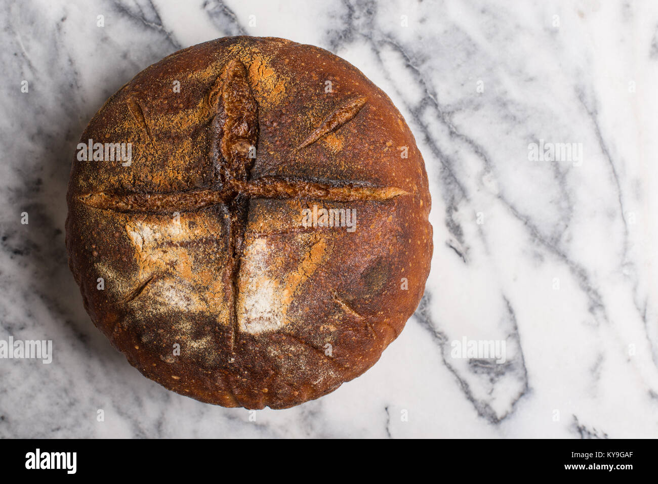 Homemade Easter traditional sourdough bread with cross sign cut Stock ...
