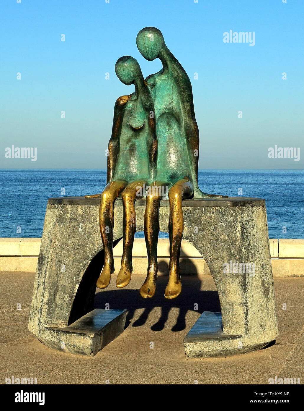 Beautiful bronze statue of man and woman melded together Stock Photo ...
