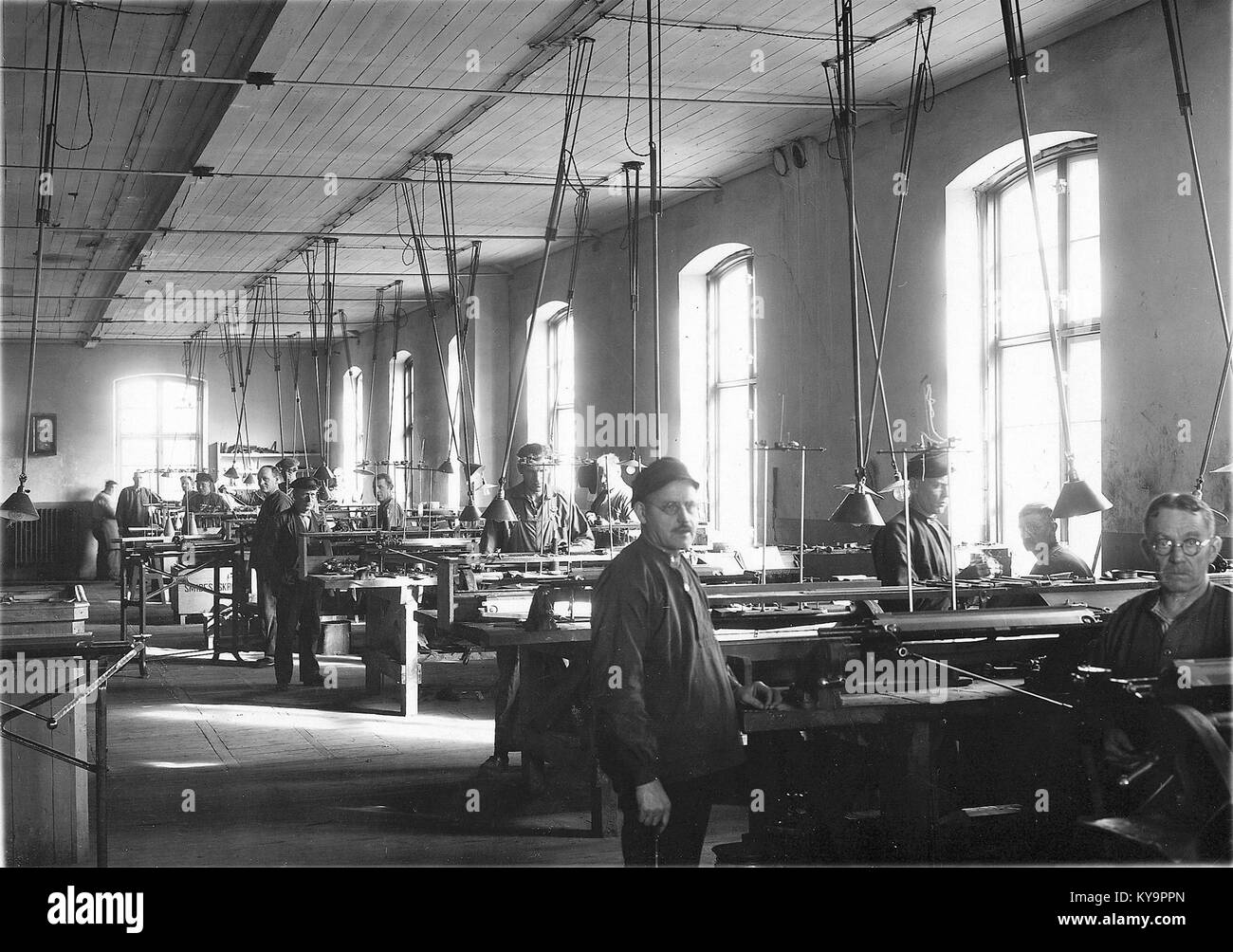 This title refers to an assembly workshop for knitting machines at the ...