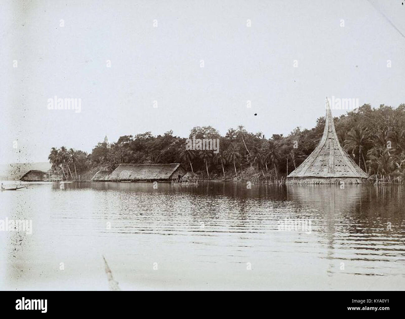 This image shows a village scene featuring the men's house. It reflects ...