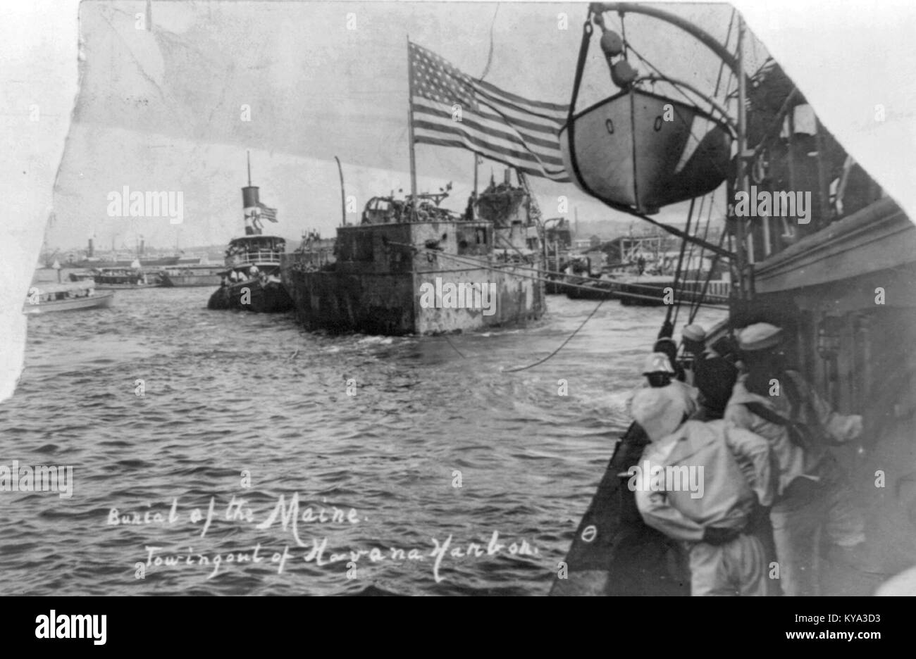The wreck of the USS Maine being towed from Havana Harbor in 1913 ...