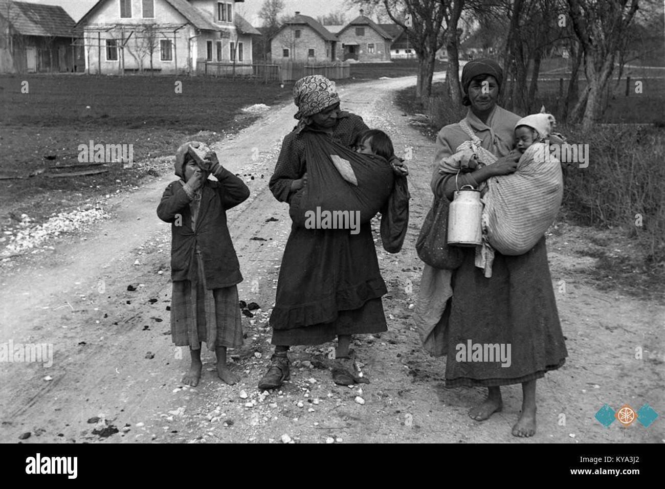 A historical photograph showing children on the road in Smarci, taken ...