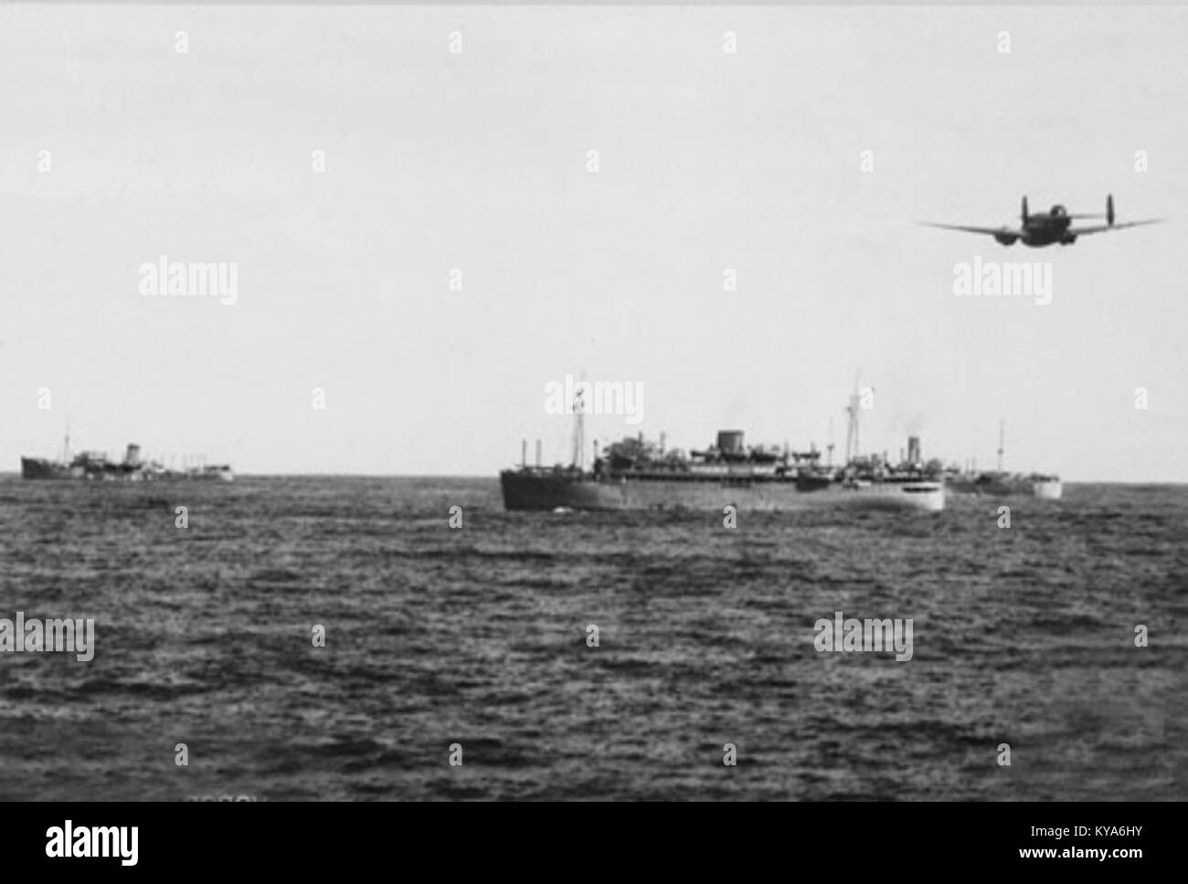 This image depicts a military troop convoy, showing vehicles, soldiers ...