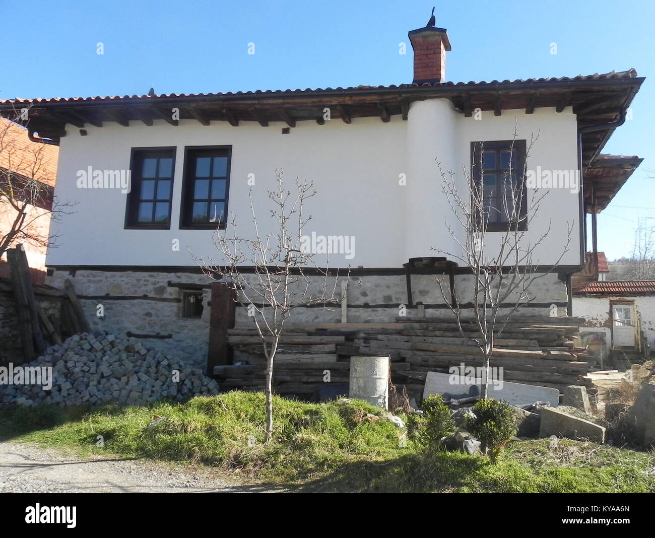 A photograph taken from the western corner of a site, showing the ...