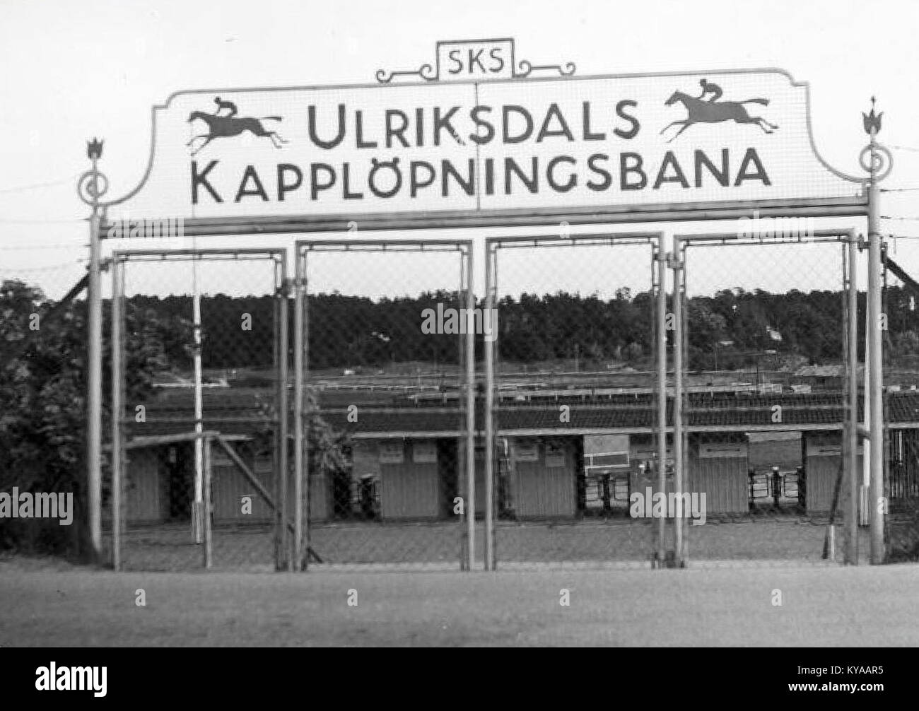 Photograph of the entrance to Ulriksdal Racecourse in Sweden, showing gate, signage, and ...