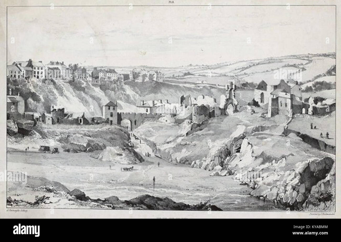 This image captures the ruins of Tenby Castle and the gate leading to ...