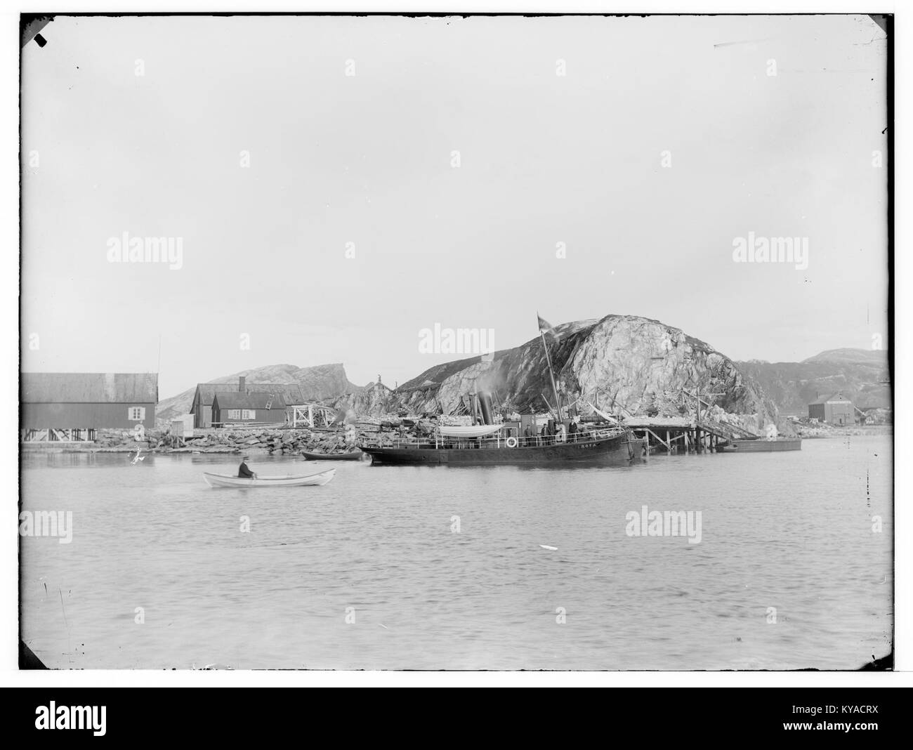 The image depicts a geological or construction site featuring a stone ...