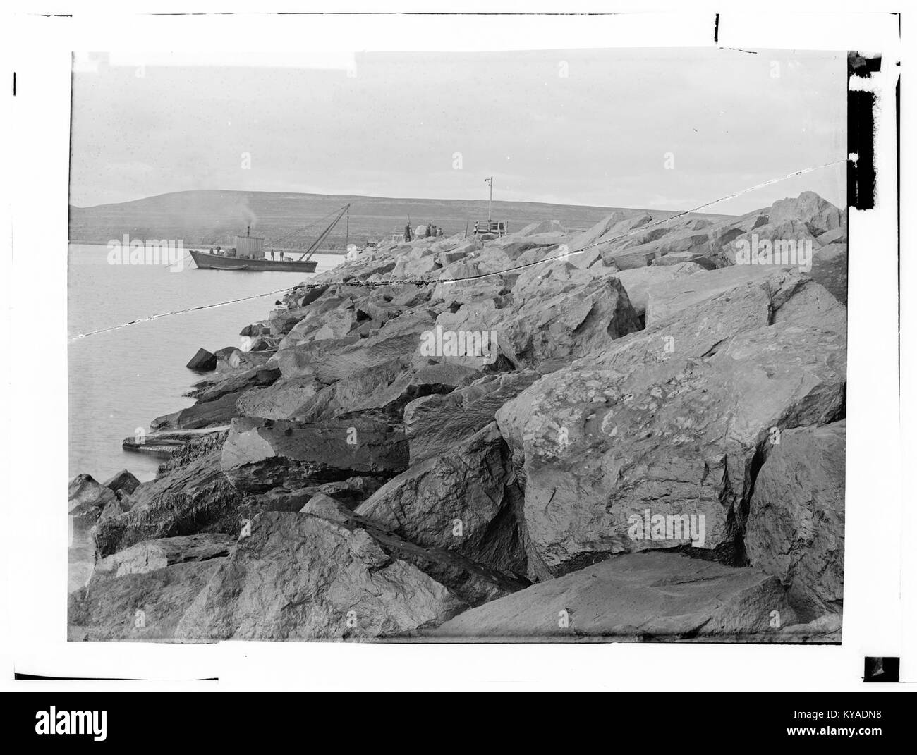 The photograph titled 'Molo, Vadsø' captures a pier and surrounding ...